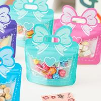 China PET Plastic Custom Printing Self Supporting Packaging Bow High End Children Gift Bag Biodegradable Food Grade Mylar Bag for sale