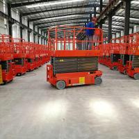 China Mini Electric Scissor Lifting Platform 4m-18m 300kg-2000kg Hydraulic Mobile Aerial Work Lift for sale