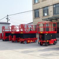China Self-Propelled Scissor Lift 10m 12m 14m Mobile Aerial Working Platform 230kg 450kg Capacity for sale