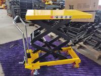 China Small Manual Hydraulic Scissor Lifting Tables 300kg 1.5M Hand Hydraulic Scissor Lift Platforms Capacity Lift Table Trolley for sale