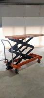 China Small Manual Hydraulic Scissor Lifting Tables 300kg 1.5M Hand Hydraulic Scissor Lift Platforms Capacity Lift Table Trolley for sale