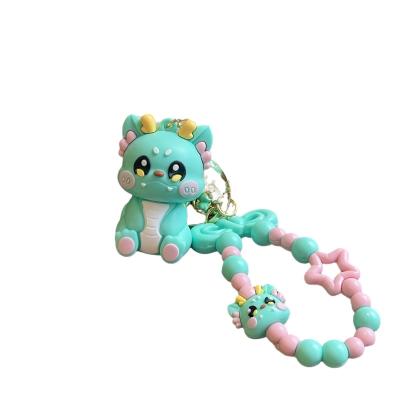 China 3.5cm*5cm PVC Dragon Keychain Cute Little Gift for Backpack Hanging Chain Included for sale