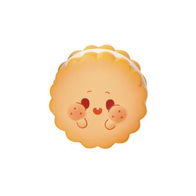 China Creative Stress Relief Soft Cookie Man Toy Slow Rebound Cream Nugget Cake for Employees for sale