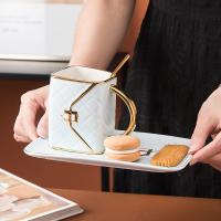 China Lingge Bag Ceramic Cup and Plate Set Gold Painted Customizable Coffee Mug Unique Gift for sale