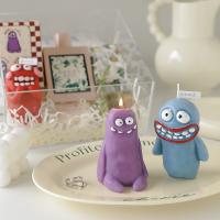China Hotel and Resort Target End User Clay Man Monster Candle for Funny Year Fragrance Gift for sale