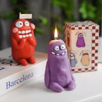 China Hotel and Resort Target End User Clay Man Monster Candle for Funny Year Fragrance Gift for sale