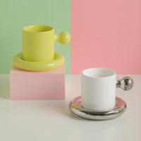 China Exquisite Nordic Candy Egg Handle Ceramic Cup and Plate Set for Company Employee Gift for sale
