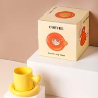 China Exquisite Nordic Candy Egg Handle Ceramic Cup and Plate Set for Company Employee Gift for sale