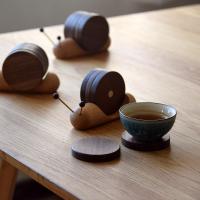 China Cartoon Black Walnut Snail Cup Cushion Wood Tea Cushion for Insulation and Decoration for sale