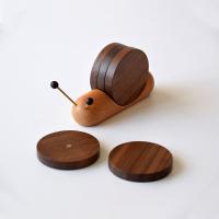 China Cartoon Black Walnut Snail Cup Cushion Wood Tea Cushion for Insulation and Decoration for sale