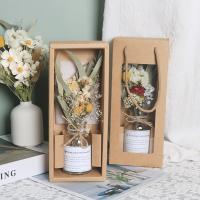 China Travel Agency Delight Goddess Day Gift Carnation Dried Flower Bouquet in Glass Bottle for sale