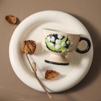 China Travel Agency Essentials Hand Painted Lily of the Valley Ceramic Coffee Cup from Finland for sale