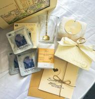 China Personalized Wedding Gift Set Towel Soap Water Cup Oolong Tea and Creative Candy Box for sale