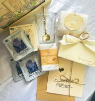 China Personalized Wedding Gift Set Towel Soap Water Cup Oolong Tea and Creative Candy Box for sale