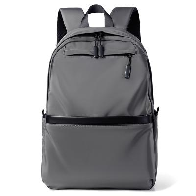 China Unisex Students Bag Backpack Zipper Closure grey color Water Resistant for sale