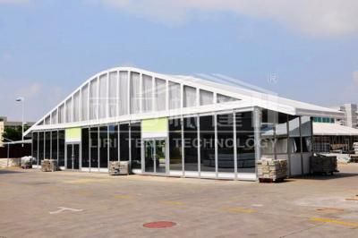 China Huge Luxury Aluminium&PVC Cover Event Tent with Arched shape and glass walls for sale