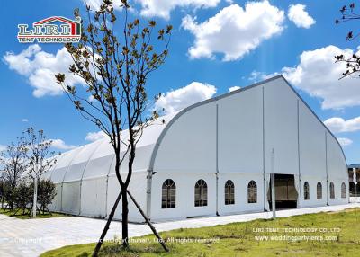 China Event Center 25m Wide Curve Tent With PVC Clear Window Glass Door for sale