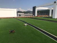 China PP Net SBR Latex Artificial Grass Turf 12-20 Stitches PP Woven Bag Drainage Holes for sale