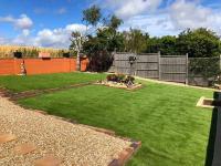 China Artificial Grass Turf For Garden Wedding Backyard 12000D 1.57 Pile Height 18900 Density for sale