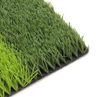 China Premium 10000 Dtex Artificial Soccer Grass with 10-Year Warranty and 3/8 Inch Gauge for Professional Fields for sale