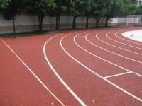 China Low Maintenance Permeable Running Track No Blistering Durable Synthetic Surface Solutions for sale