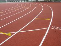 China Low Maintenance Permeable Running Track No Blistering Durable Synthetic Surface Solutions for sale