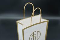 China ODM Recycled Paper Shopping Bags Personalized Bulk Kraft Bags With Handles for sale