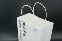 China Biodegradable Packaging Kraft Bags recycled Custom Printed Paper Bags With Handles for sale