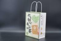 China Reusable custom printing paper bags sturdy Kraft Paper Shopping Bags With Logo for sale
