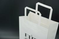 China Versatile Custom White Paper Bags Packaging Paper Shopping Bags for sale