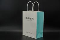 China Durable Tea Packaging Paper Bags Lightweight White Gift Bags With Handles for sale
