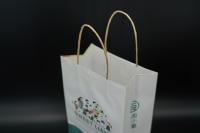 China Versatile Large Paper Gift Bags With Handles Yellow Twisted FSC for sale