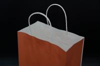 China Custom Orange Eco Paper Bags With Handles Twisted Solid Plate Printing for sale