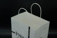 China Printing White Eco Paper Bags With Handles Twisted Oversized Bottom for sale