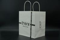 China Printing White Eco Paper Bags With Handles Twisted Oversized Bottom for sale