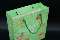 China Multicolored Printing Kraft Cookie Paper Bag Hygienic PP Rope Handle for sale