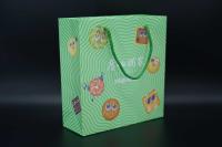 China Multicolored Printing Kraft Cookie Paper Bag Hygienic PP Rope Handle for sale