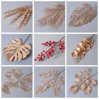 China Golden artificial eucalyptus gingko Persian Leaf Areca Palm Monstera with Red Cherries for sale