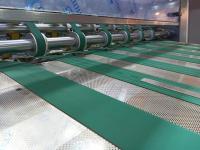 China High Speed UV Varnishing Machine with 9500 sheets/hour, 730x1060mm Max Sheet Size and Teflon Conveying Belt for Paper Processing for sale