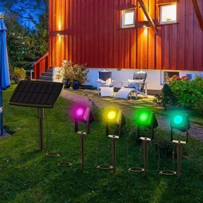 China 4-Pack 12W Solar Landscape Spotlights RGBW Color Changing Outdoor Lighting with 180 Degree Beam Angle and IP65 Waterproof for sale