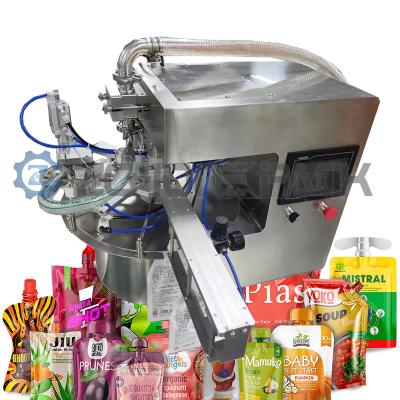 China Desktop Turntable Filling And Capping Machine Nozzle Bag Small Packaging Machine for sale