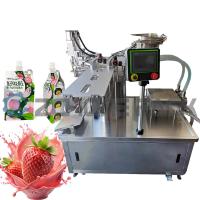 China Double Head Nozzle Bag Filling and Capping Machine with One Person Hanging Bag for sale