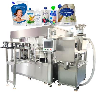 China High-speed Electric Automatic Spout-top Bag Filling Capping Machine Labeling Easy Operate for Liquids Pastes Water-based for sale