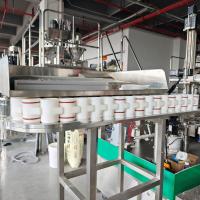 China Tea Cake Packing Machine | Premade Pouch Packing Machine with Rotary Feeder & Nitrogen Flushing | Pu Er Tea Brick Packing Line for sale