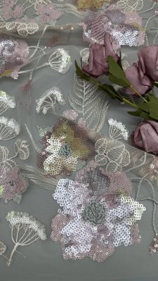 China New Collection Sequin Embroidered Fabric Floral Mesh Ground for Garments Gowns Fashion Design for sale