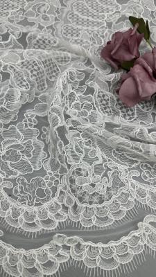 China Handmade Floral Embroidery On Lace Artistic Detailing Tulle Mesh Fabric For Wedding Dresses for sale