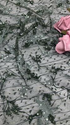 China Black Sequin Embroidered Floral Mesh Fabric Sheer Elegance with Subtle Shine For New Collection for sale