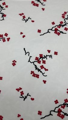 China Traditional Snowflowers  Flocked Mesh Lace Design Fabric Customized for Elegant Fabric for sale