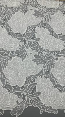 China Luxary Laser Embroidered Lace High Quality Guipure Fabric Beautiful Special Design for sale