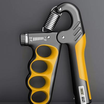China Adjustable Silicone Grip Strengthener 18x10x9cm 600g Portable Hand Exerciser for Men Women for sale